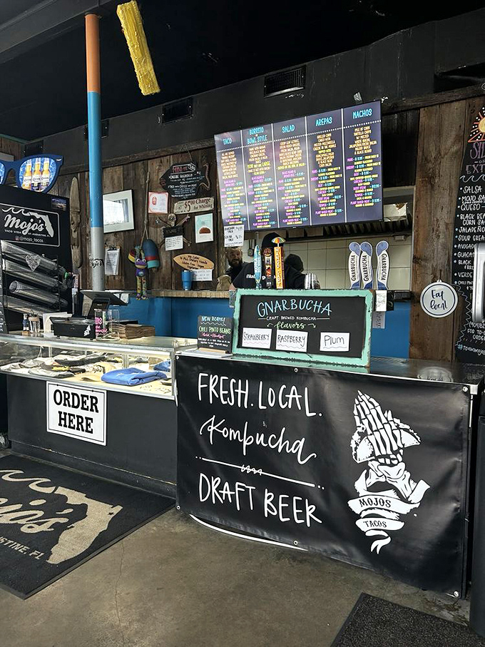 Where the magic happens. The counter at Mojo's is command central for flavor operations, complete with local kombucha and draft beer options.