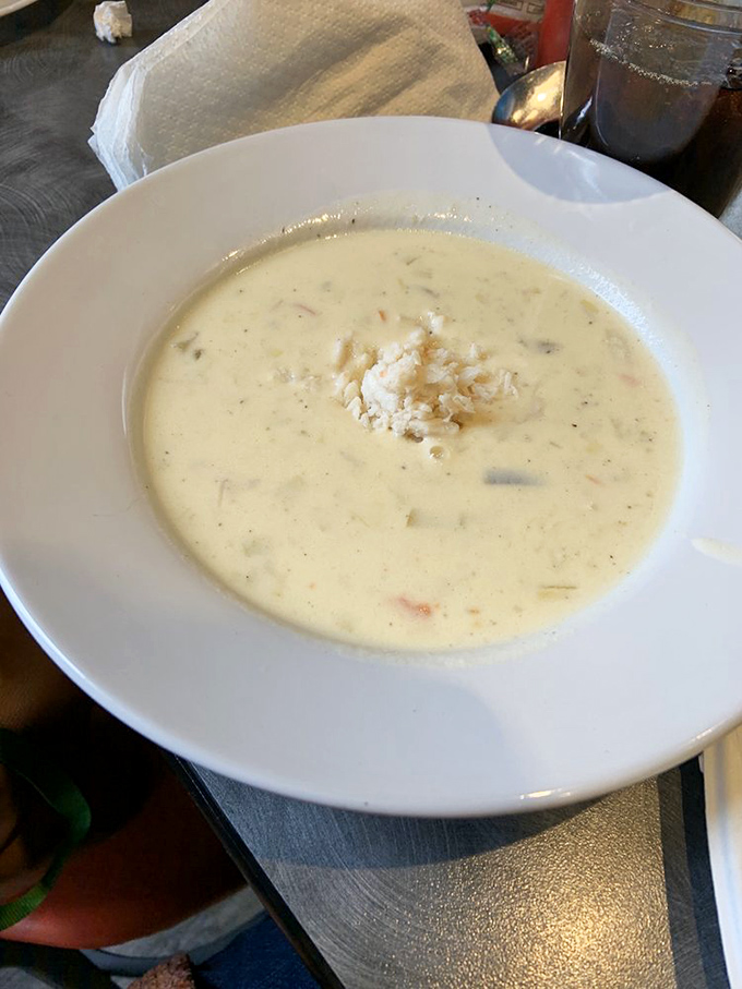 This isn't just soup—it's a warm hug in a bowl. Creamy crab bisque that makes you forget about counting calories.