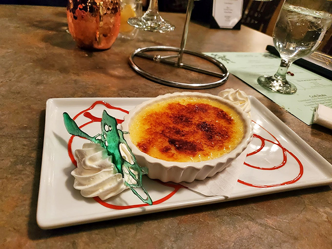 Cr&egrave;me br&ucirc;l&eacute;e with a playful garnish&mdash;proof that serious desserts can still have a sense of humor. That crackling sugar top is music to your ears.