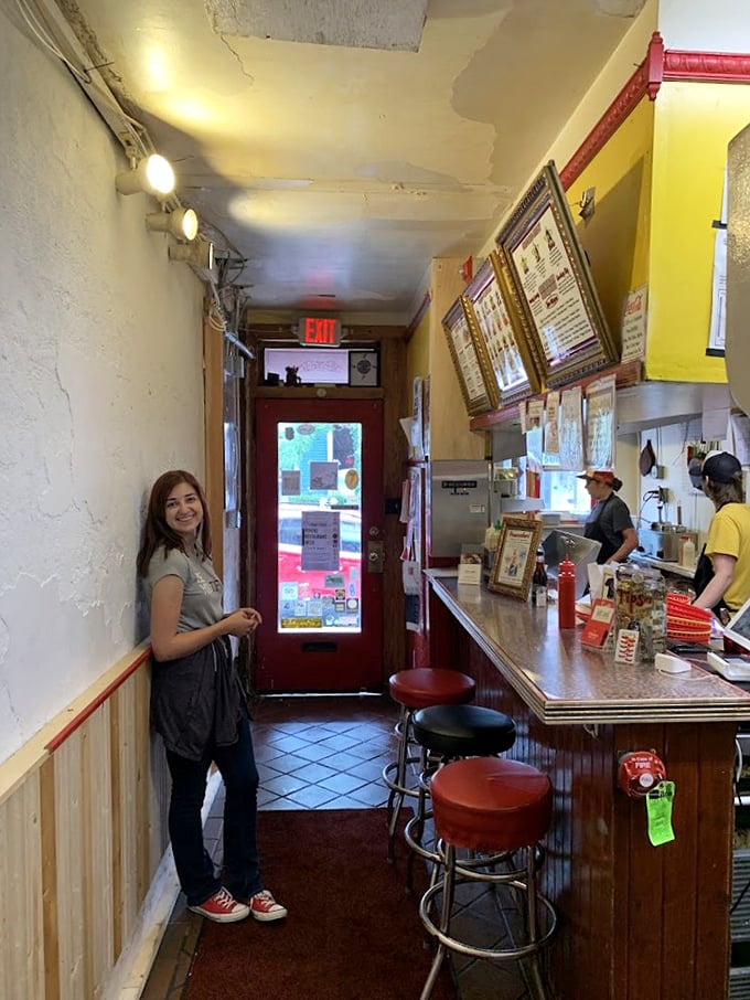 Pure joy captured in a single moment, proving that great food creates the best smiles.