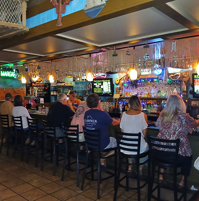 Happy diners around wooden tables tell the real story of this neighborhood treasure.