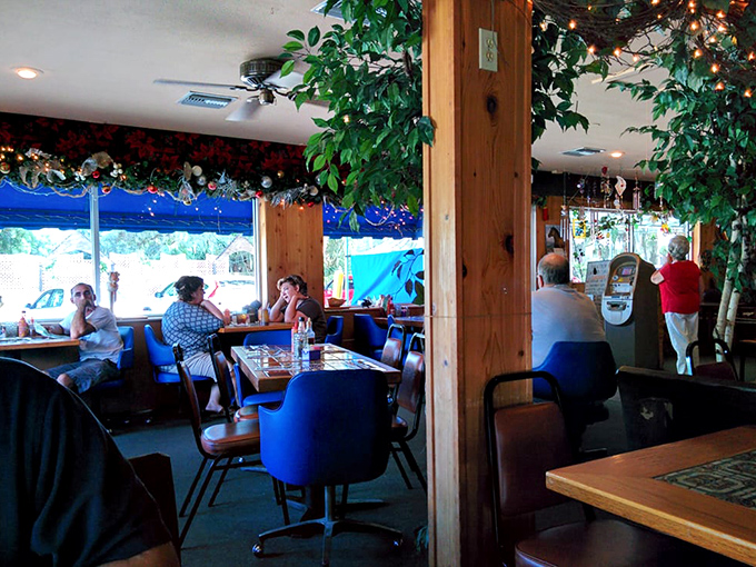 Blue vinyl chairs and genuine smiles create the perfect atmosphere for memorable meals and lasting friendships.