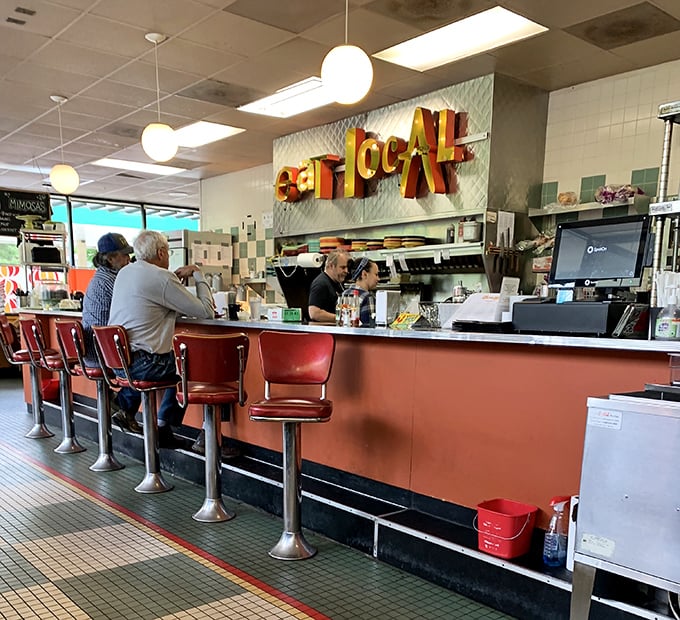 The counter seats offer front-row tickets to breakfast theater, where culinary magic happens before your eyes.