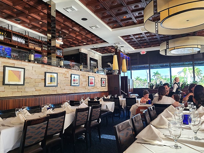 Ornate ceilings, crisp linens, and palm tree views. Billy's dining room proves seafood can be casual and sophisticated simultaneously.