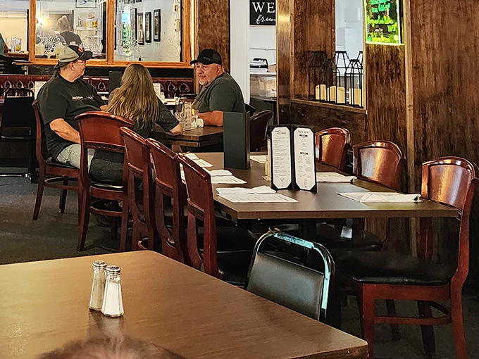 The dining room hums with the satisfied murmurs of regulars who've been coming for decades and newcomers about to become converts.