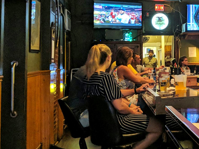 The bar at Clover Club&mdash;where strangers become friends, friends become family, and everyone becomes an expert sports commentator after the second beer.