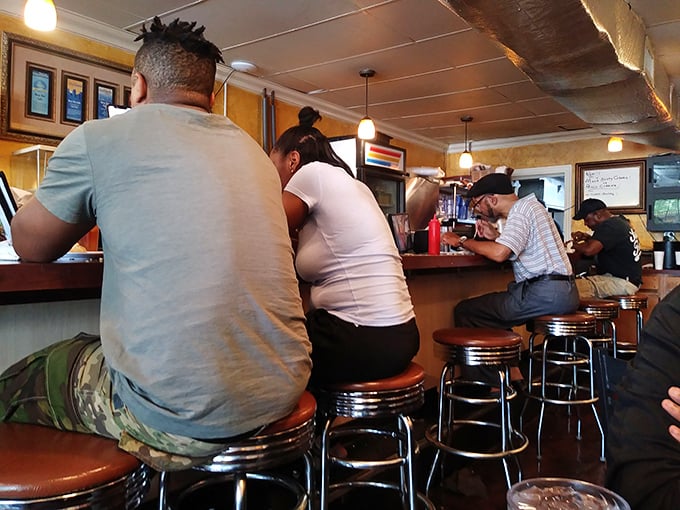 The counter seating isn't just functional &ndash; it's front-row tickets to Atlanta's longest-running culinary show.