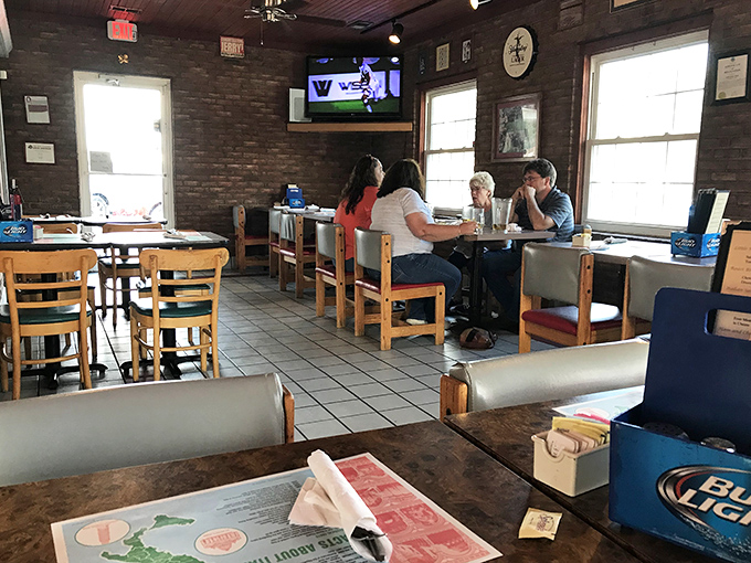 The dining room buzzes with that unmistakable energy of people having conversations that matter over food that matters even more.