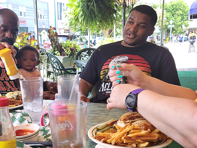 Great food brings people together at Kelly's outdoor tables. Conversations flow as freely as the beverages, creating memories that last longer than the meal itself.