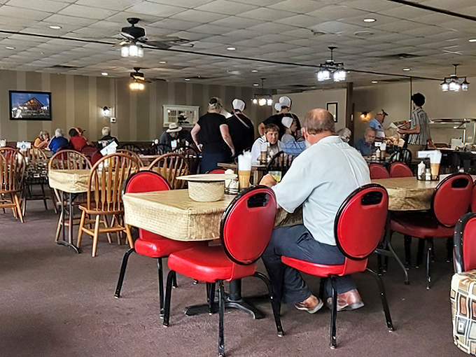 A dining room where strangers become neighbors and calories don't count. Notice the conspicuous absence of smartphones &ndash; conversation is the appetizer here.