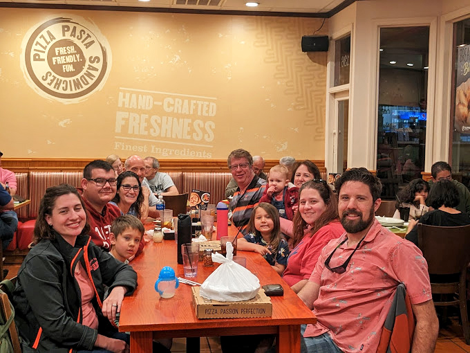 Where family memories are made one slice at a time. The universal language of pizza bringing generations together.