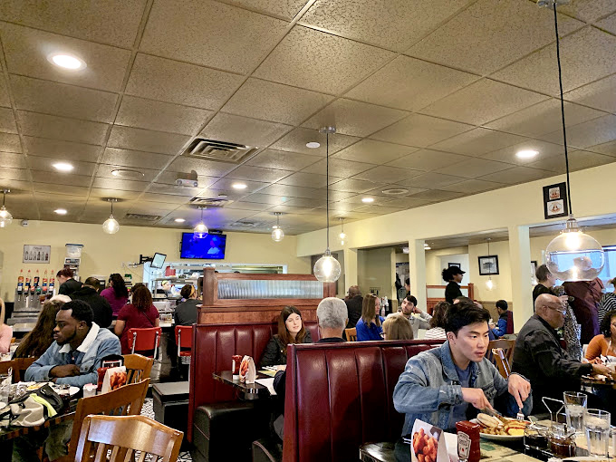 A full house at Trip's isn't just customers &ndash; it's a community of breakfast enthusiasts united in their pursuit of the perfect morning meal.