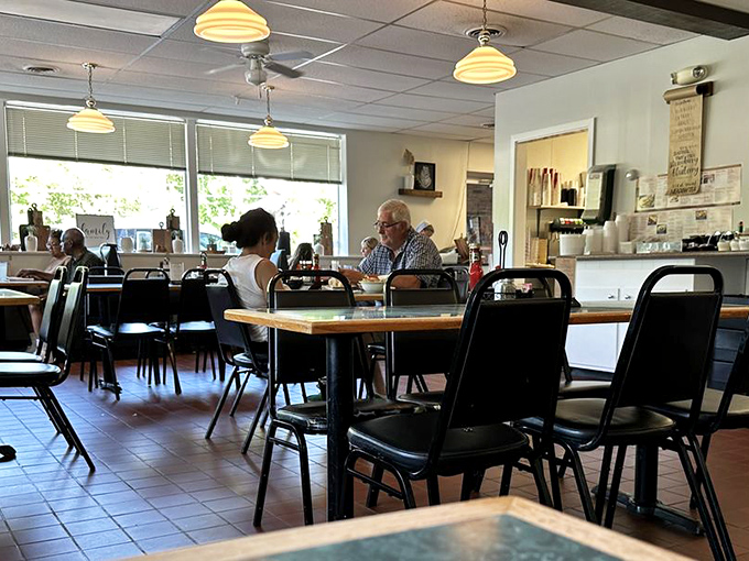 The dining room at Katie's Kitchen&mdash;where strangers become neighbors and everyone's united by the universal language of "mmm" and "pass the gravy."