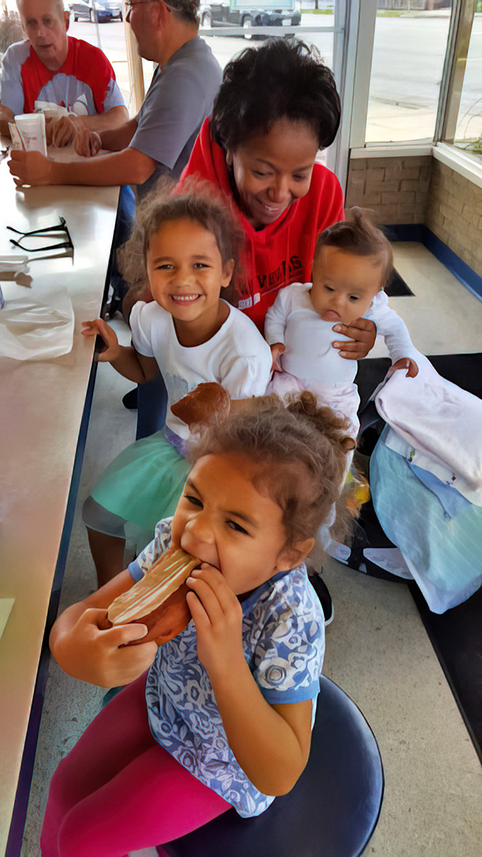 Counter seating where locals gather like old friends, sharing coffee and stories that never get old.