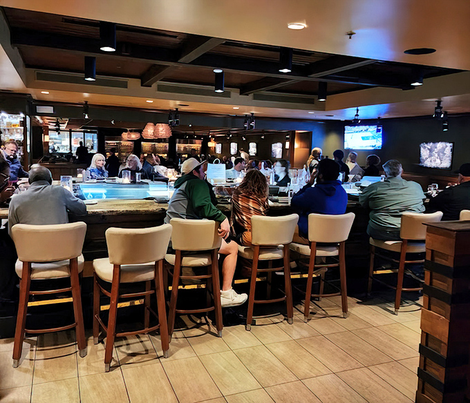 The bar area buzzes with the energy of people making excellent life choices, all centered around premium spirits and good company.