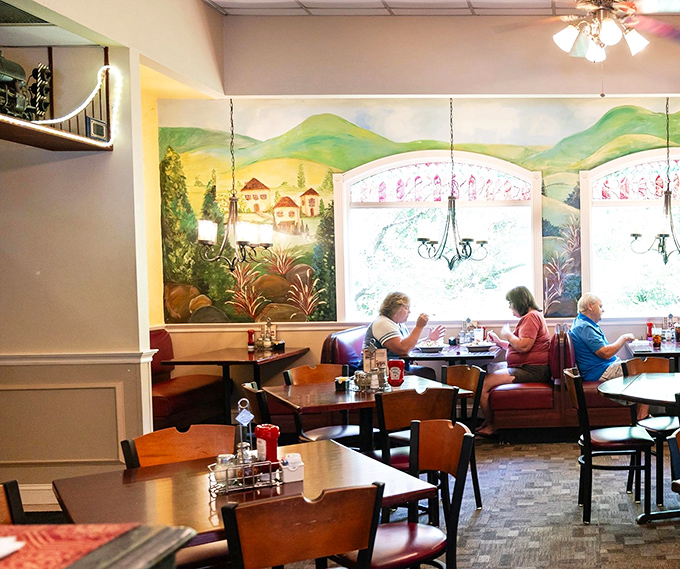 A mural that transports you to the Italian countryside while you feast. Multitasking at its most delicious. 