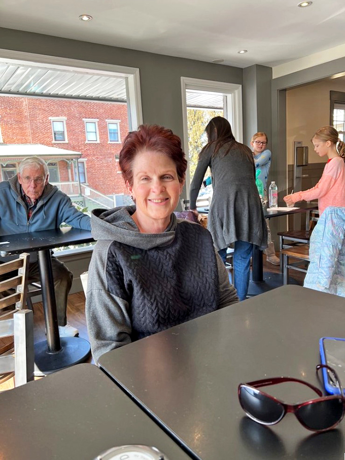 The dining area buzzes with conversation and comfort &ndash; the kind of place where strangers become temporary neighbors over plates of excellent food.