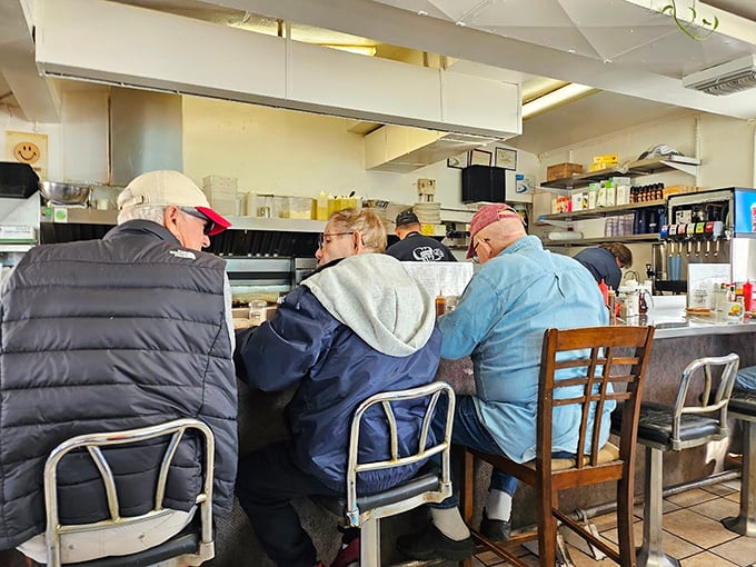 The counter crew&mdash;Tucson's breakfast society in session. These folks know the secret handshake to start the day right.