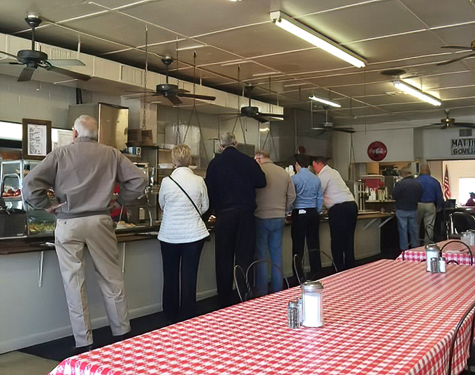 The cafeteria line &ndash; where strangers become neighbors and important decisions about mac and cheese versus collard greens are contemplated daily.