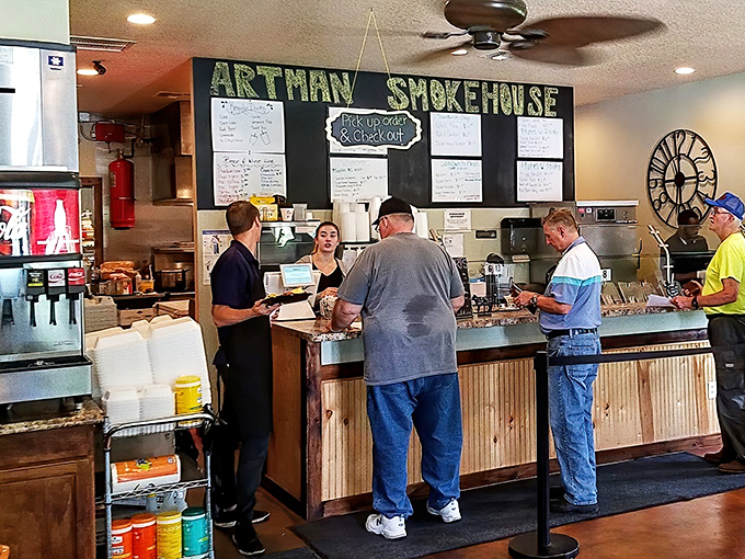 The counter service setup where barbecue dreams begin. Notice nobody's looking at their phones&mdash;all eyes on the prize.