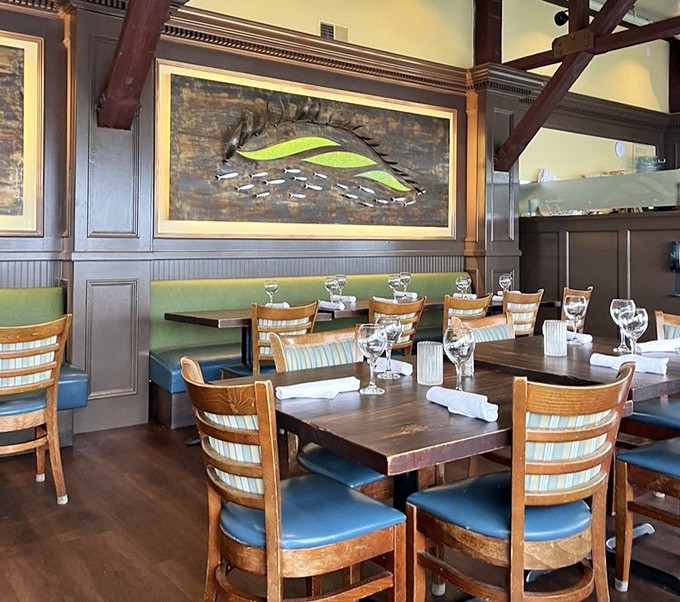 Wooden beams, nautical art, and comfortable seating create the perfect backdrop for seafood feasting without distracting from those million-dollar views.
