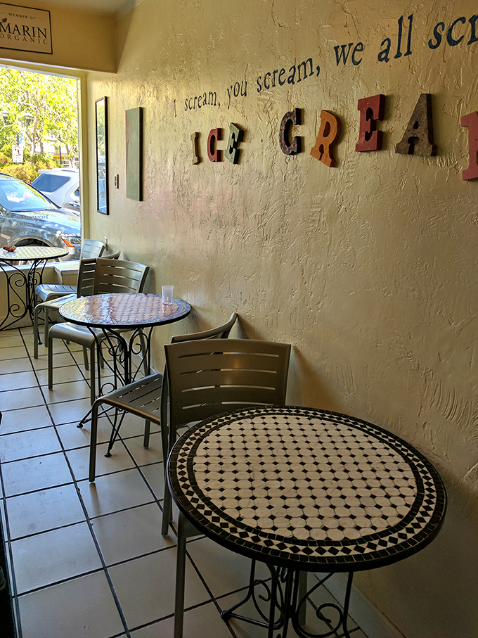 Bistro tables with Moroccan-inspired mosaics create the perfect stage for the main event: watching ice cream slowly disappear.
