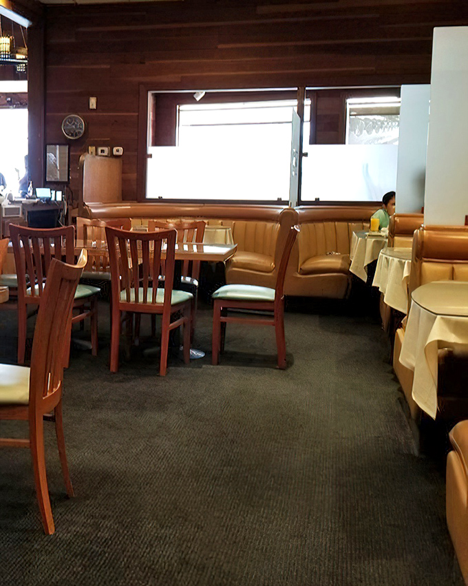 Cozy booths where countless Sunday mornings have been spent debating the merits of sweet versus savory breakfast choices.