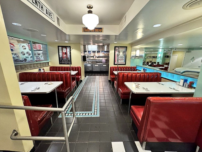 Red vinyl booths standing at attention like delicious soldiers, ready to cradle you through a meal that your doctor wouldn't approve but your soul desperately needs.