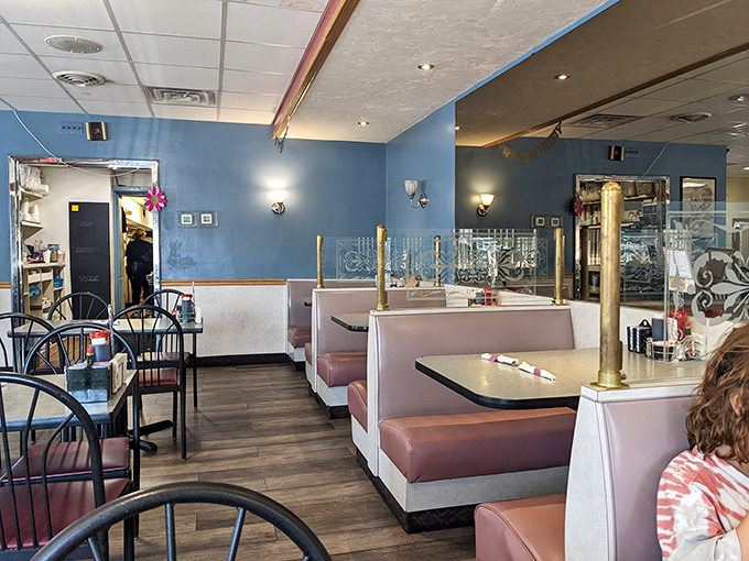 Pink booths and blue walls create that perfect retro atmosphere where comfort food tastes even better.