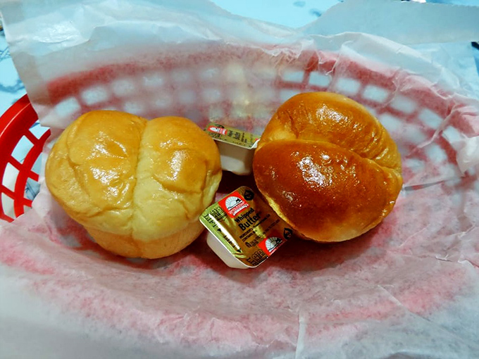 Fresh dinner rolls with butter pats&mdash;the opening act that sets the stage for seafood stardom. Simple pleasures are often the most satisfying.