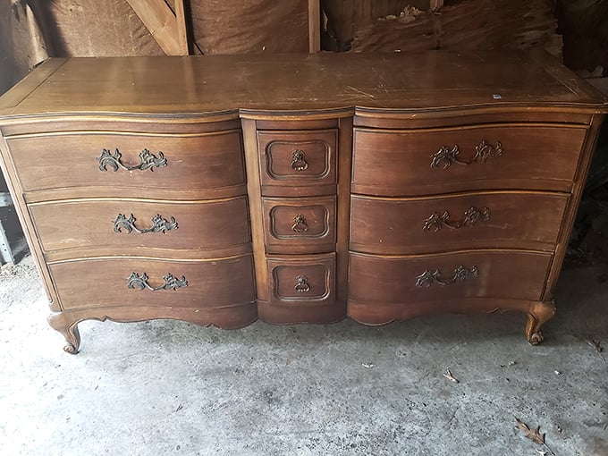 This French Provincial dresser isn't just furniture; it's the "before" photo in your next DIY restoration masterpiece.