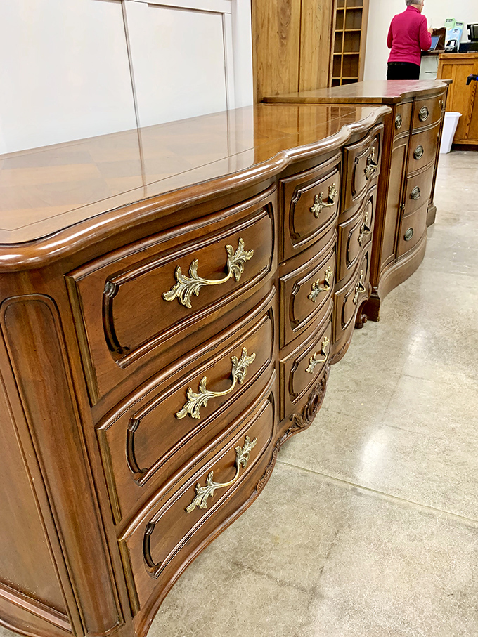 Curves in all the right places! This dresser has more character in its brass handles than most modern furniture has in its entirety.