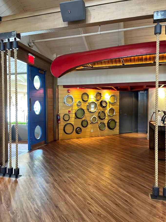 Porthole windows and nautical details aren't just decoration&mdash;they're a promise. This entrance says, "Leave your landlubber expectations at the door."