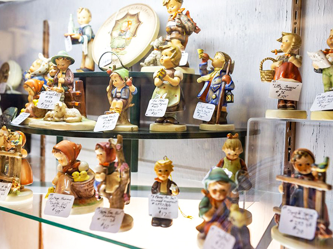 Hummel figurines standing in formation—the MVPs of curio cabinets everywhere, preserved in their perpetual childhood innocence.