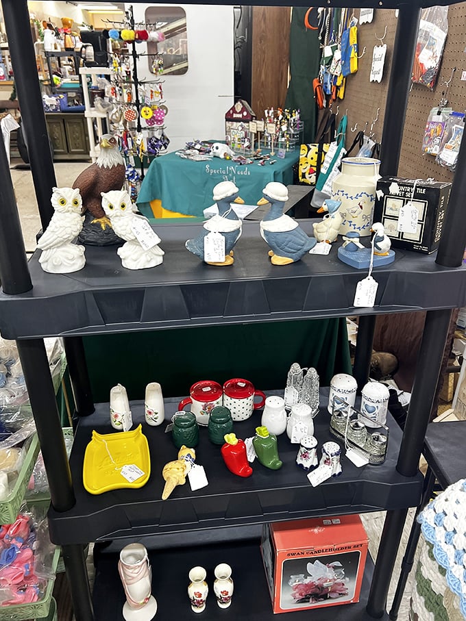 A menagerie of decorative creatures awaits adoption. These ceramic owls and ducks stand at attention, ready to migrate to mantels and bookshelves across Indiana.