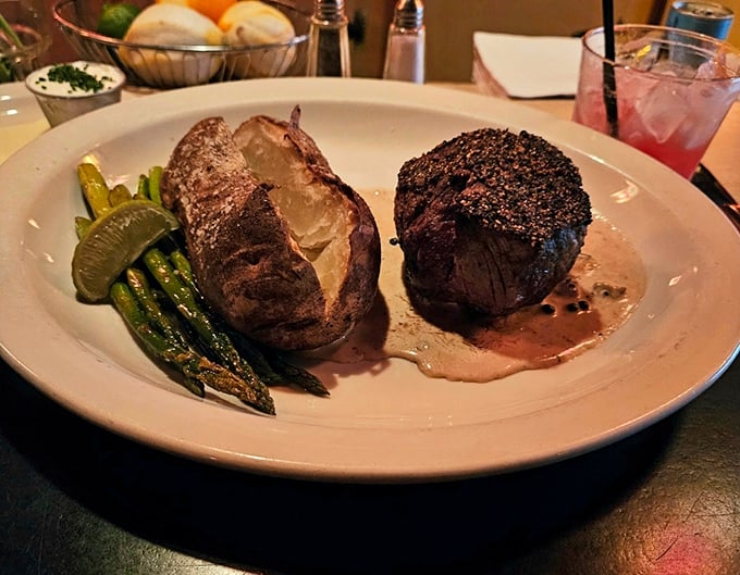 A filet mignon that needs no introduction, accompanied by a baked potato that could feed a small village. Simple perfection that proves less is more.