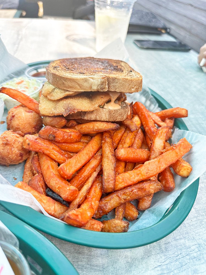 This sandwich and sweet potato fries combo isn't just lunch&mdash;it's a vacation on a plate. The kind of meal that makes you forget to check your phone.