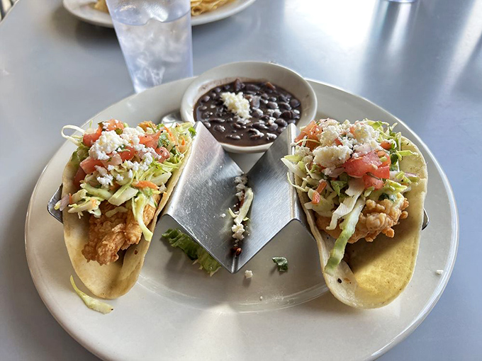 Fresh fish tacos bring a touch of coastal flair to this landlocked Texas comfort food paradise. 