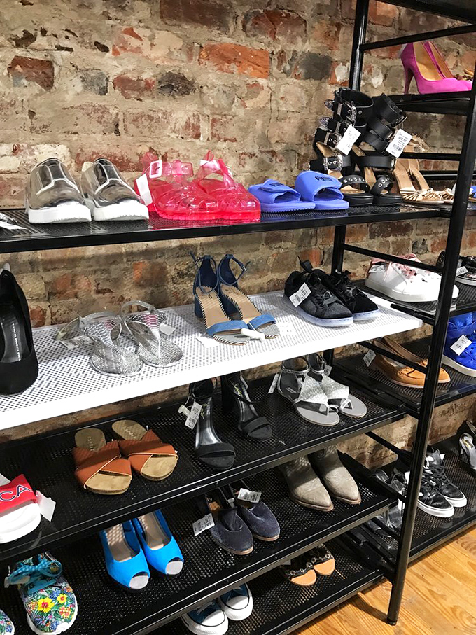 Footwear heaven against exposed brick walls&mdash;from practical flats to statement heels, each pair awaits its Cinderella moment.