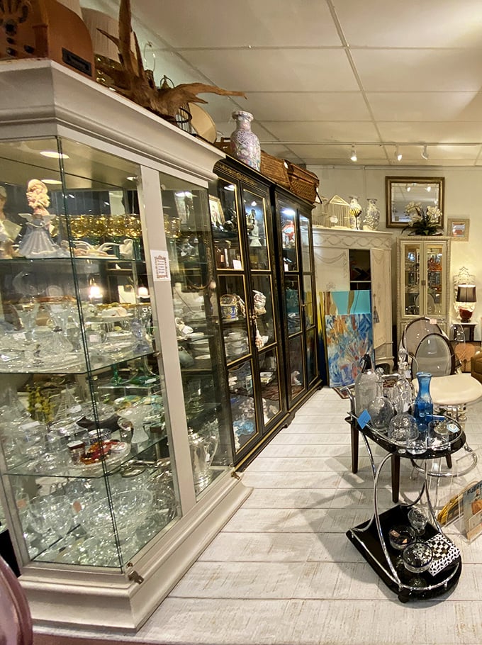 Crystal catches light like diamonds caught in glass, creating miniature rainbows that dance across shelves of carefully curated collectibles.