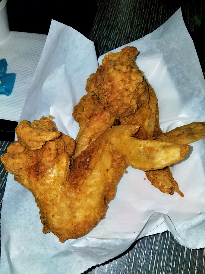 Fried chicken with a crust so perfectly seasoned and crispy, it might make you temporarily forget your table manners.