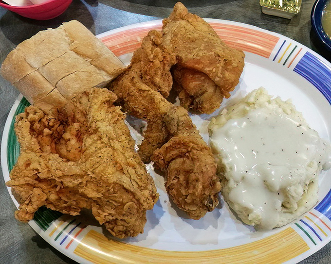 Fried chicken so perfectly golden it deserves its own Instagram filter. Paired with mashed potatoes that could make a grown man cry.