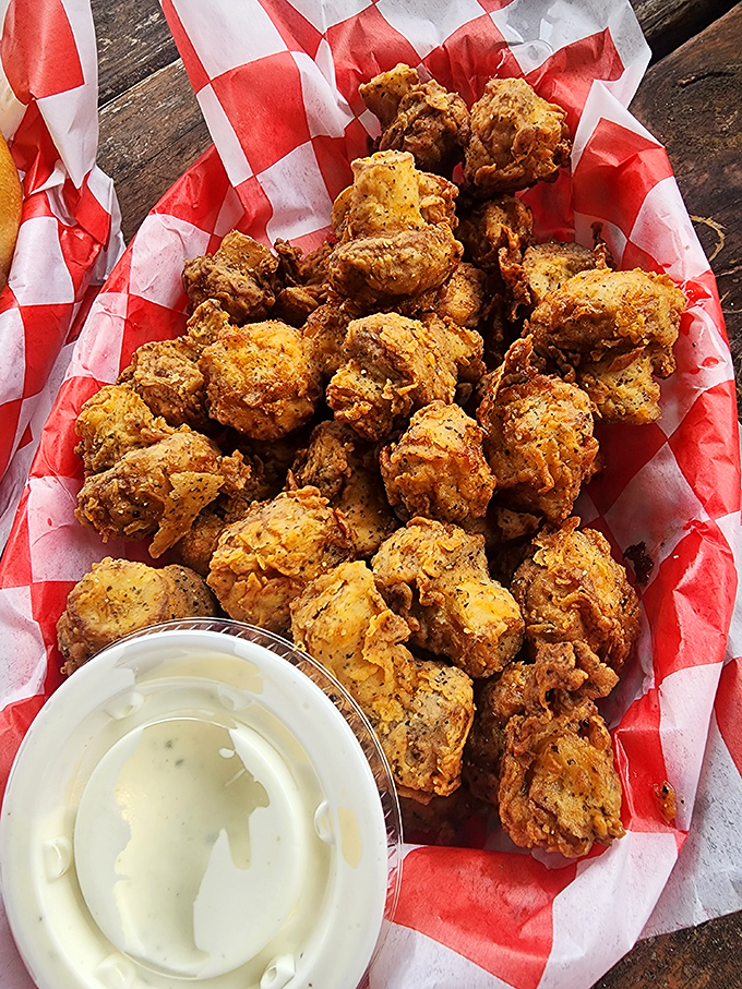 These golden-fried mushrooms aren't just appetizers&mdash;they're little umami bombs of joy. The dipping sauce is non-negotiable.