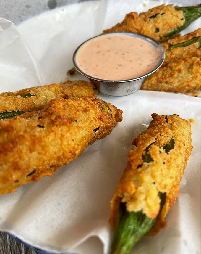 Crispy fried okra that manages to solve the eternal okra dilemma: deliciously crunchy outside, perfectly tender inside, with nary a hint of slime.