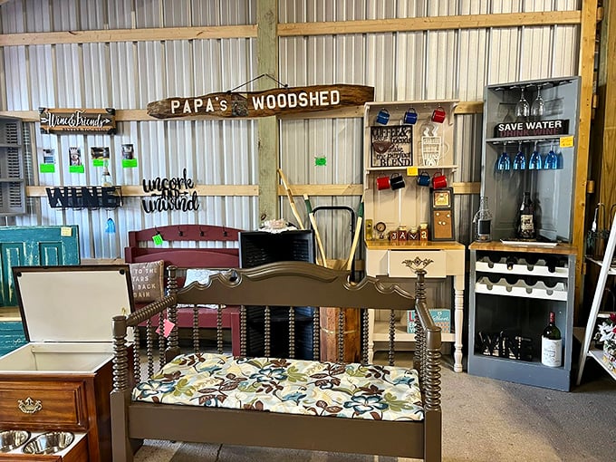 "Papa's Woodshed" indeed! This furniture display combines rustic charm with practical pieces, including a spindle bed that screams vintage Americana. 