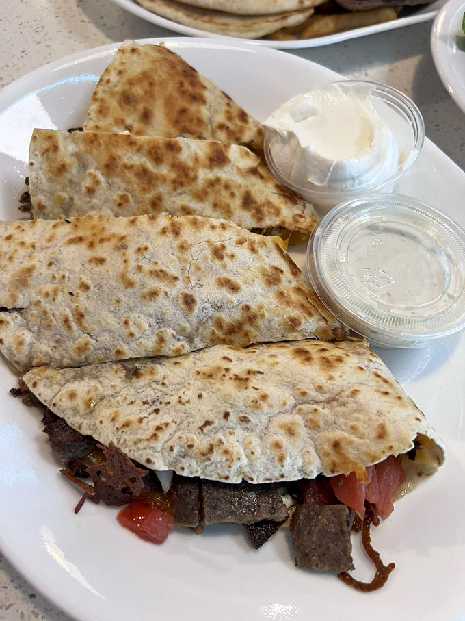 Fusion food before it was trendy&mdash;these Greek quesadillas marry Mediterranean flavors with Tex-Mex technique in a culinary peace treaty that works deliciously well.
