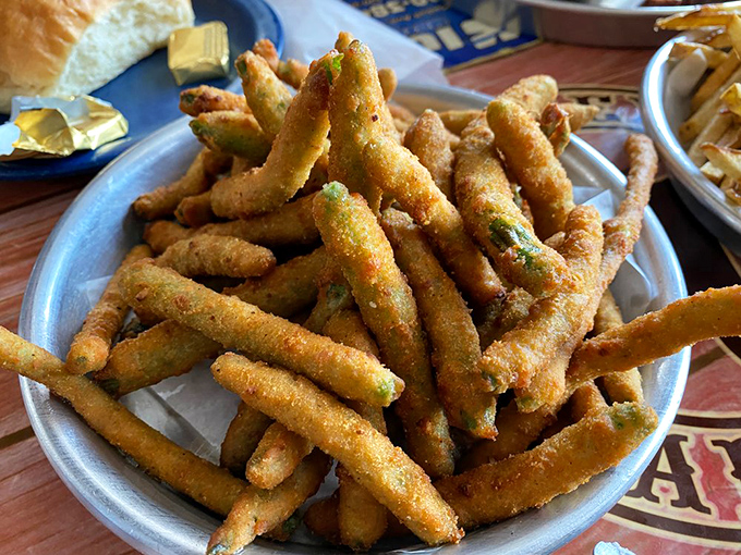 Green bean fries that somehow count as vegetables while tasting like indulgence. Crispy, golden-battered magic that'll make you forget regular fries exist.