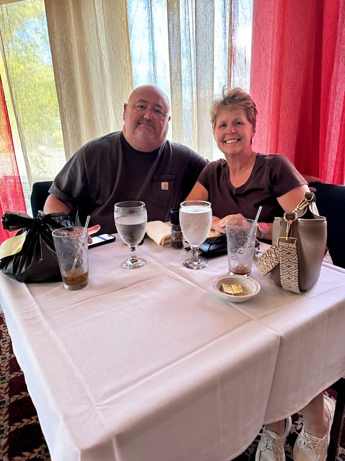 The genuine smiles tell the whole story: this is where memorable meals and lasting friendships happen naturally.