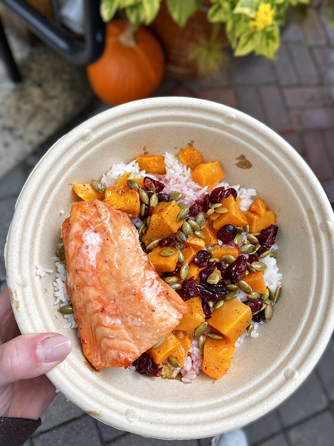 Salmon and squash bowl that makes "eating clean" feel like cheating. Those cranberries and pumpkin seeds aren't just toppings&mdash;they're little flavor bombs.