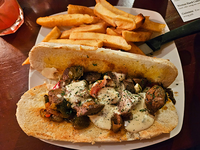 This sandwich isn't messing around &ndash; loaded with savory morsels and creamy sauce, it's the kind of meal that requires both hands and zero shame.